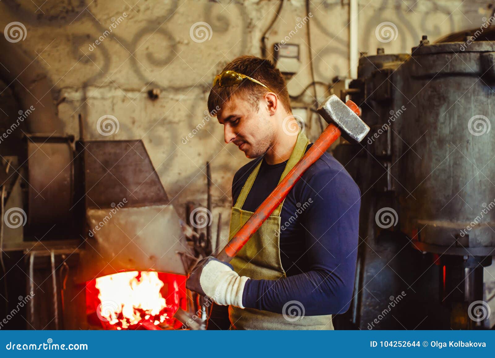 The Blacksmith is at the Forge Stock Photo - Image of iron, craftwork ...