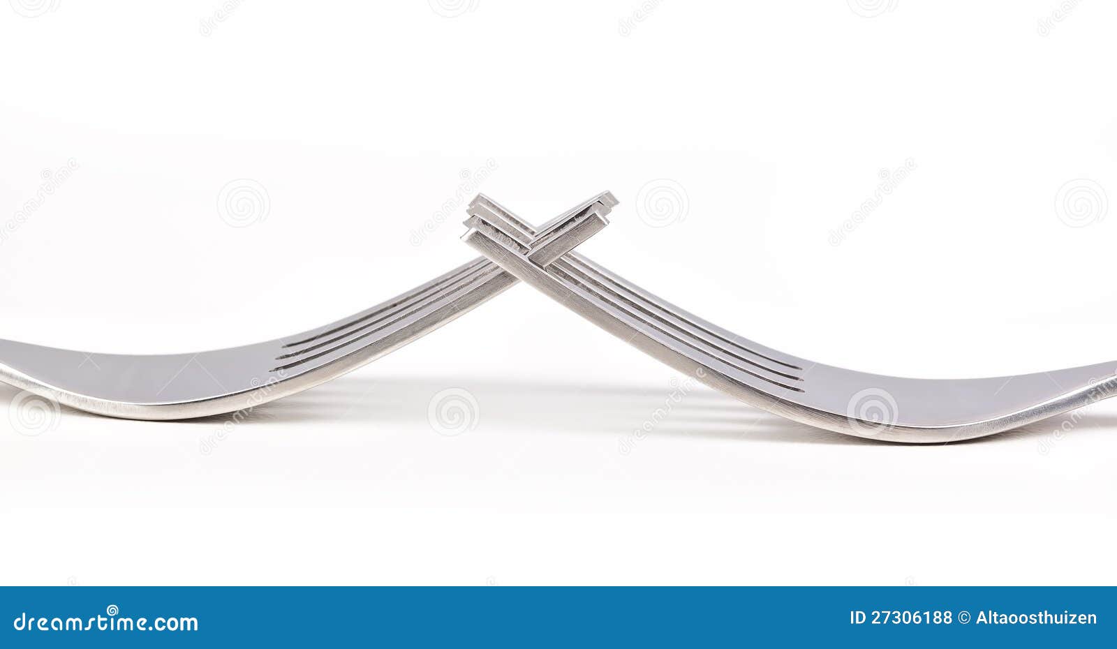 Two Forks Cross on White Surface Stock Photo - Image of crisscross ...