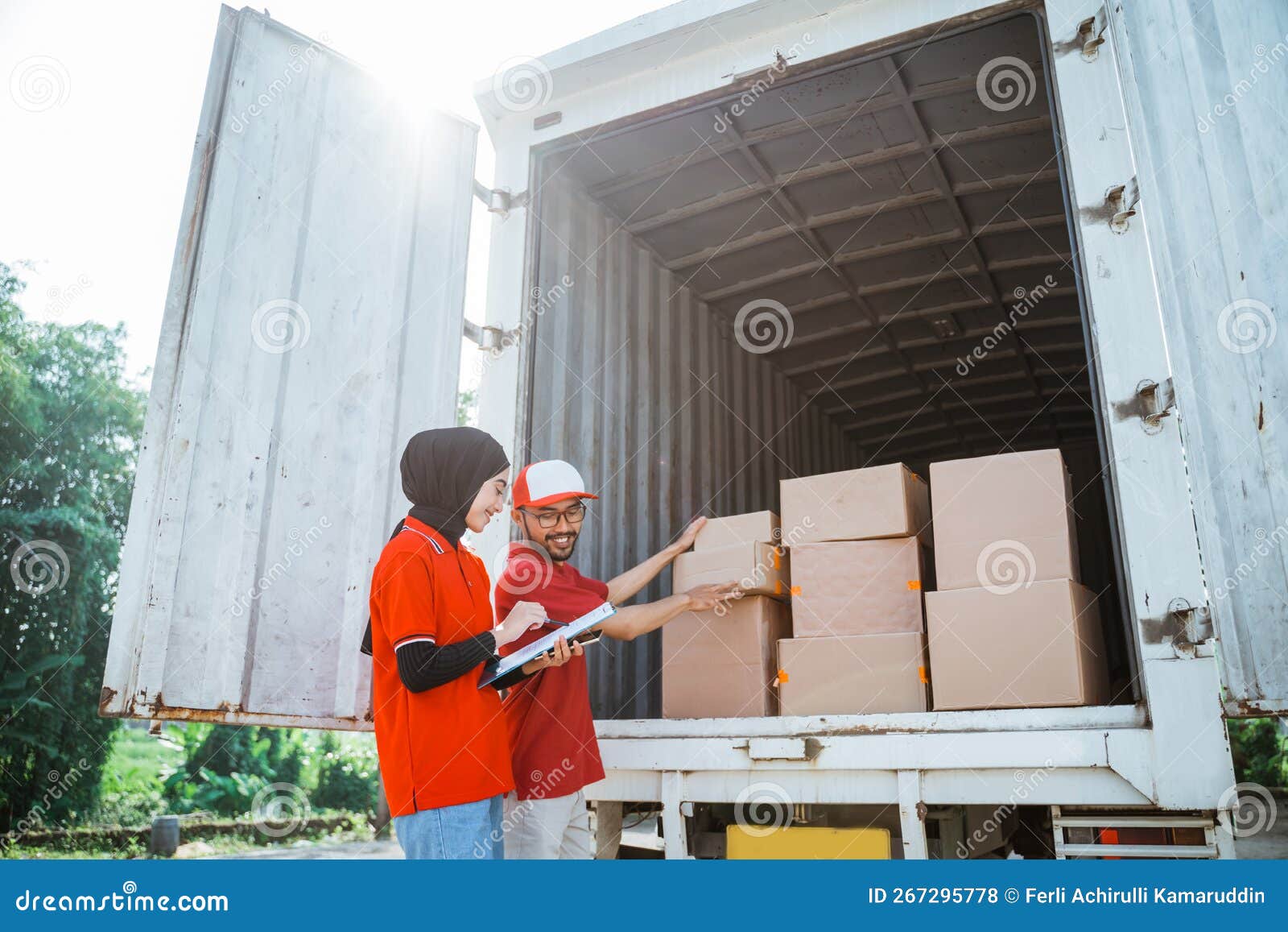 Two Forwarders Checking Boxes of Delivery Packages in a Cargo Stock ...