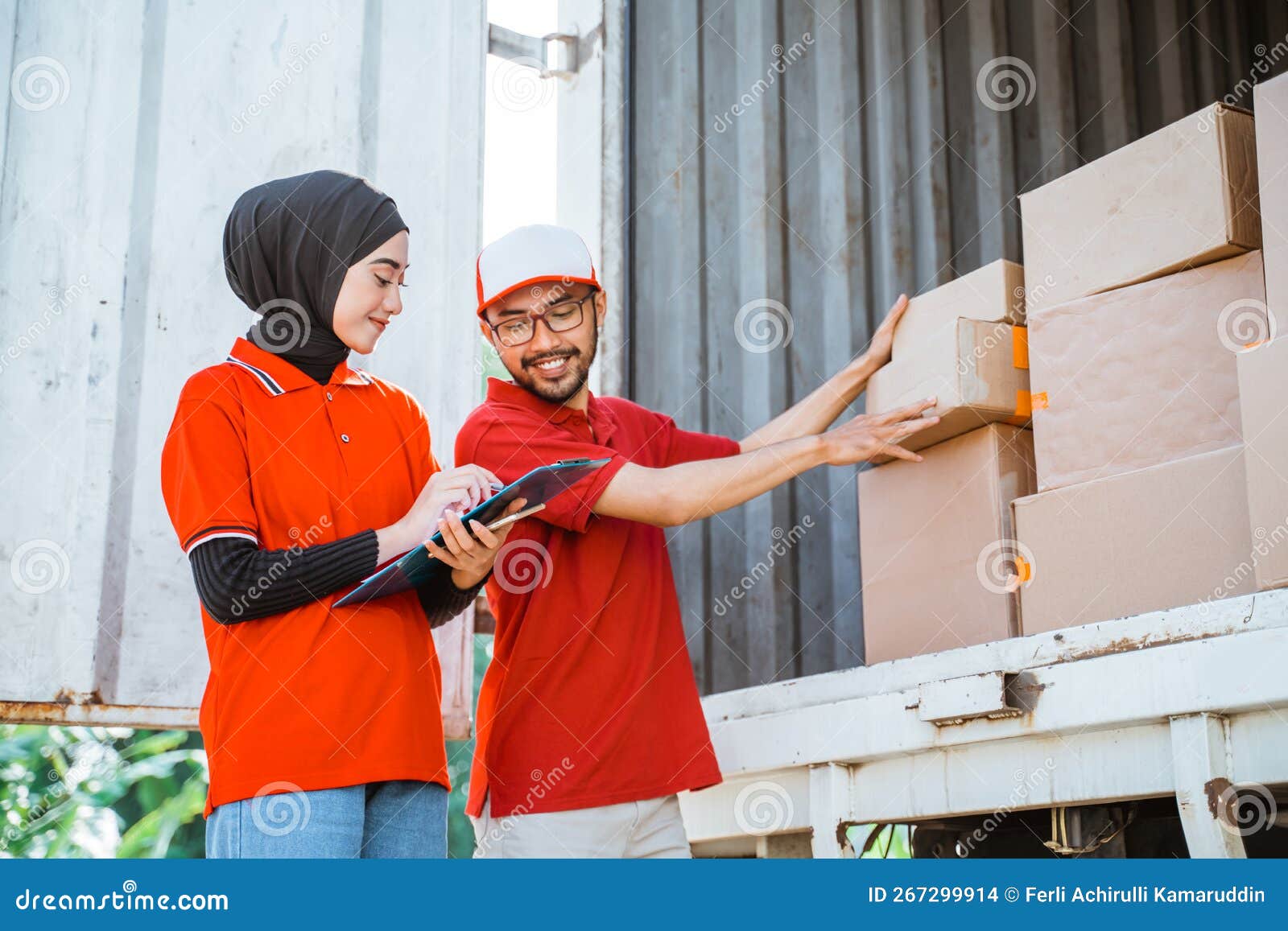 Two Forwarders Checking Boxes of Shipping Packages in a Cargo Stock ...