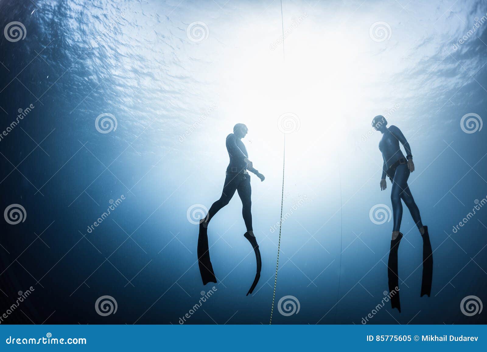 Two Free Divers Ascending from the Depth Stock Image - Image of buddy ...