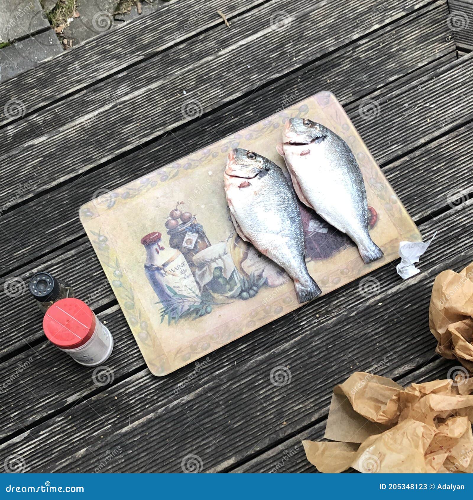 Two Fresh Fish on the Blackboard Stock Image - Image of spoon, article ...