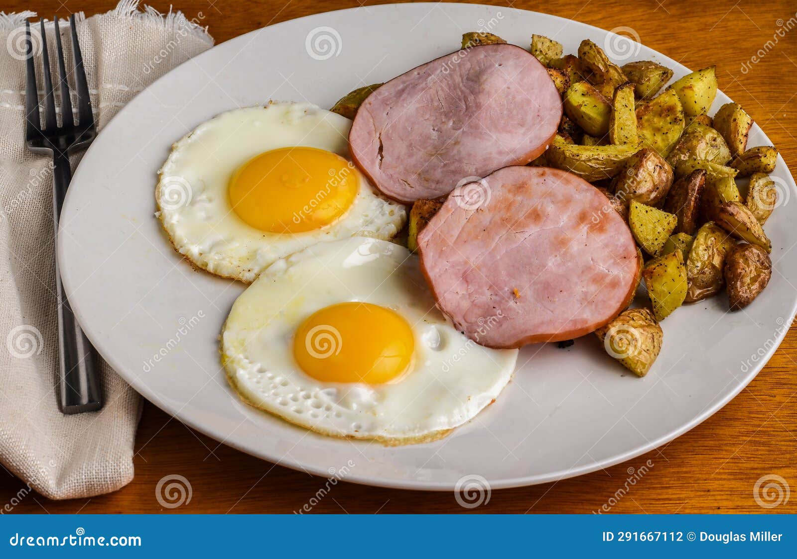 Two Fried Eggs Served with Canadian Bacon Stock Photo - Image of ...