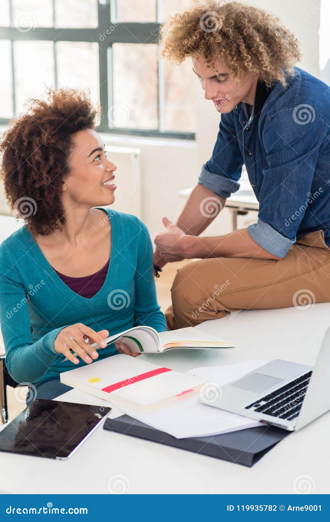 Two Friendly Classmates of Different Nationalities Talking about a ...