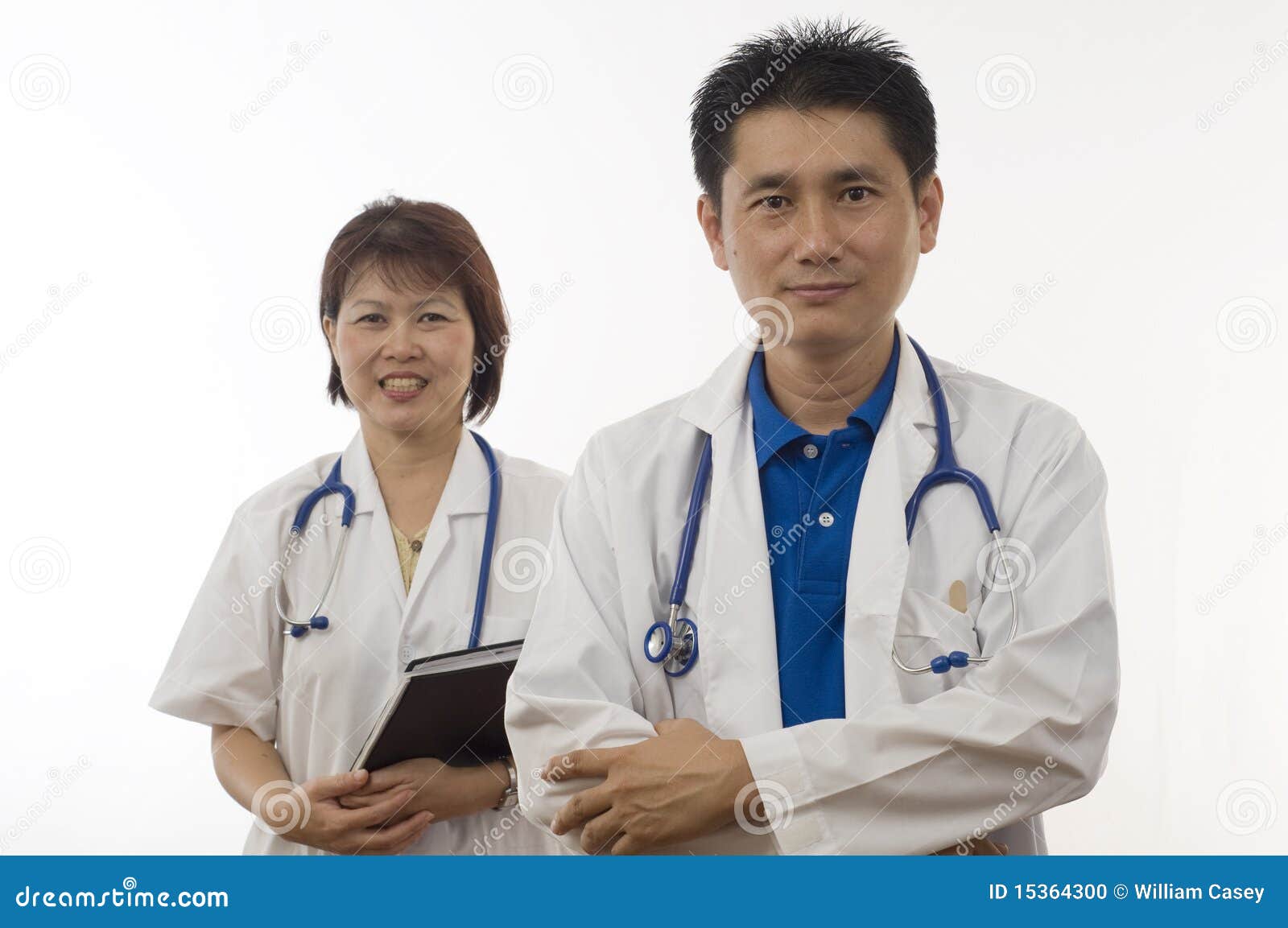 Two friendly Doctors stock photo. Image of female, arms - 15364300