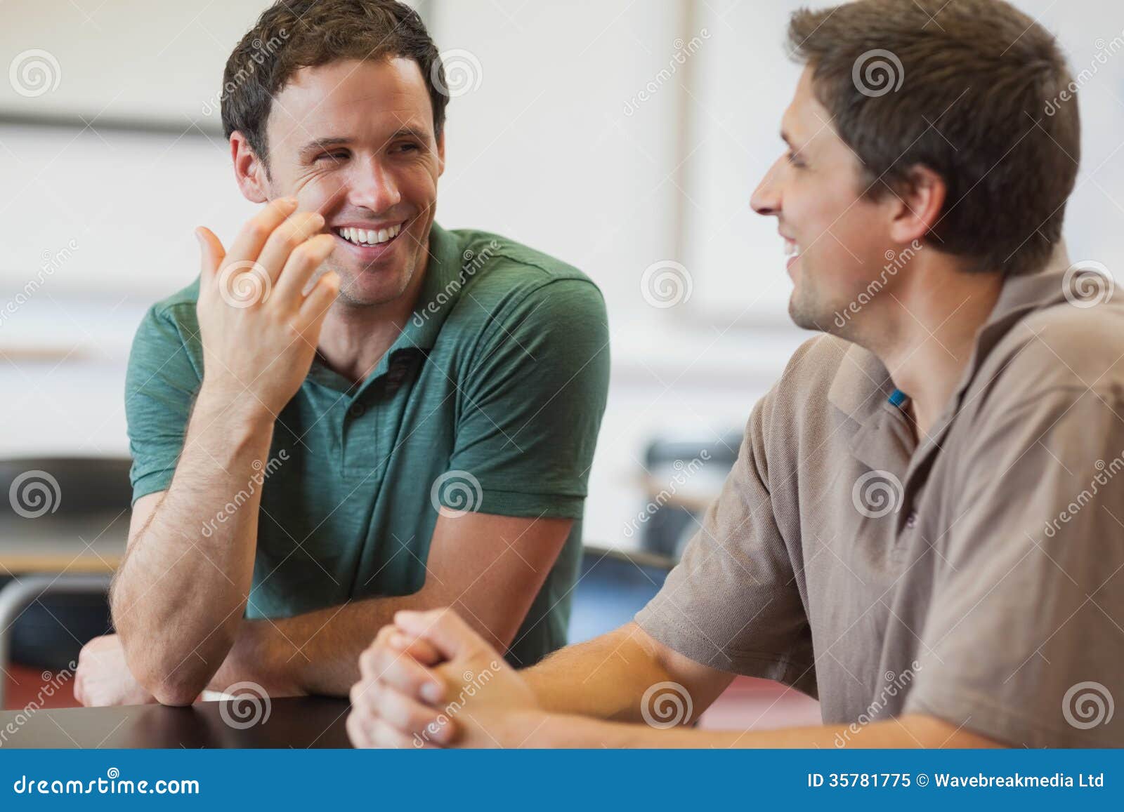 Two Friendly Male Mature Students Chatting Stock Image - Image of ...