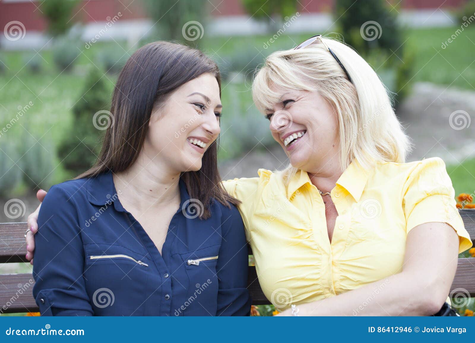 Two Friends on a Break in the Park Stock Photo - Image of group ...