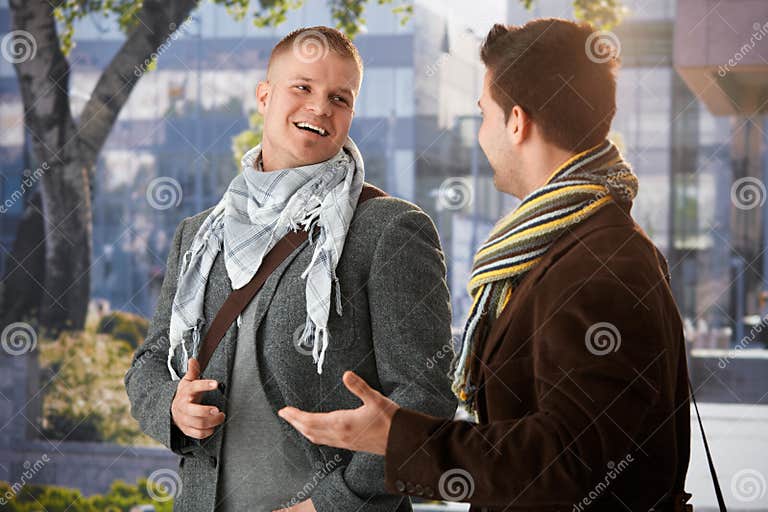Two Friends Chatting Outdoors Stock Photo - Image of hand, good: 21229404
