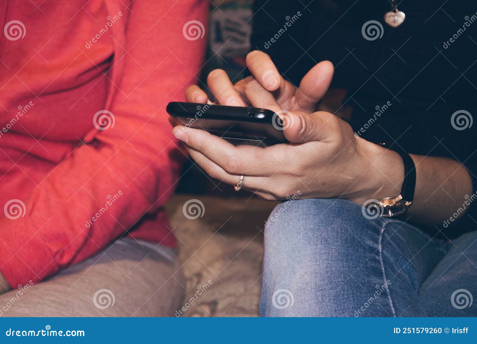 Two Friends Communicate, Holding Smartphone in Hands Stock Photo ...
