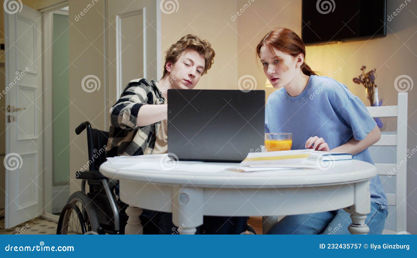 Two Friends are Discussing and Watching Something on the Computer ...