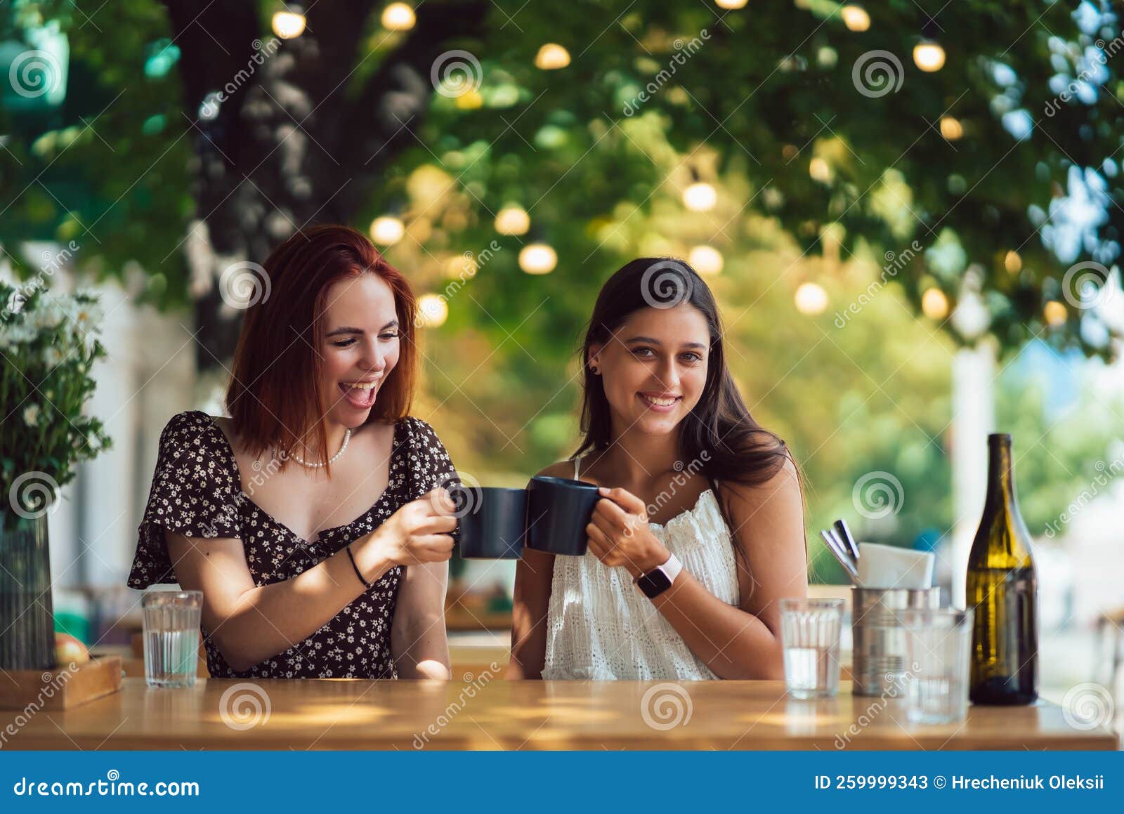 Two Friends Drinking Coffee Women Clinking With Cups Of Coffee Stock Image Image Of Together