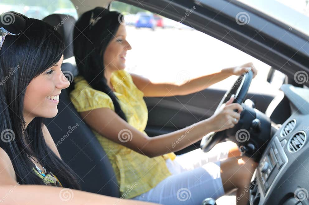 Two friends driving in car stock photo. Image of detail - 21241588