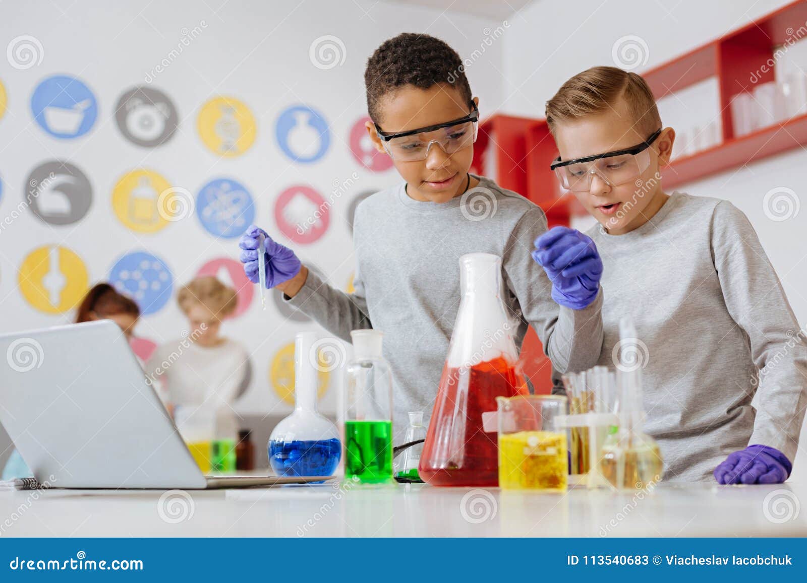 Two Friends Experimenting With Chemicals In Lab Stock Image Image Of