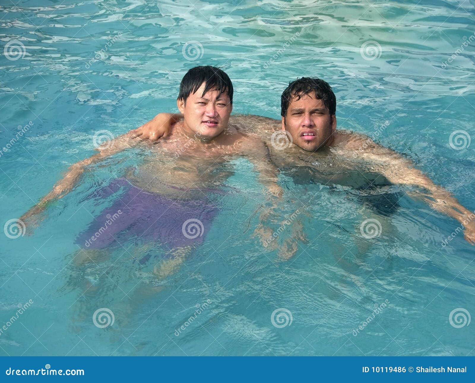 Two friends floating stock photo. Image of float, water - 10119486