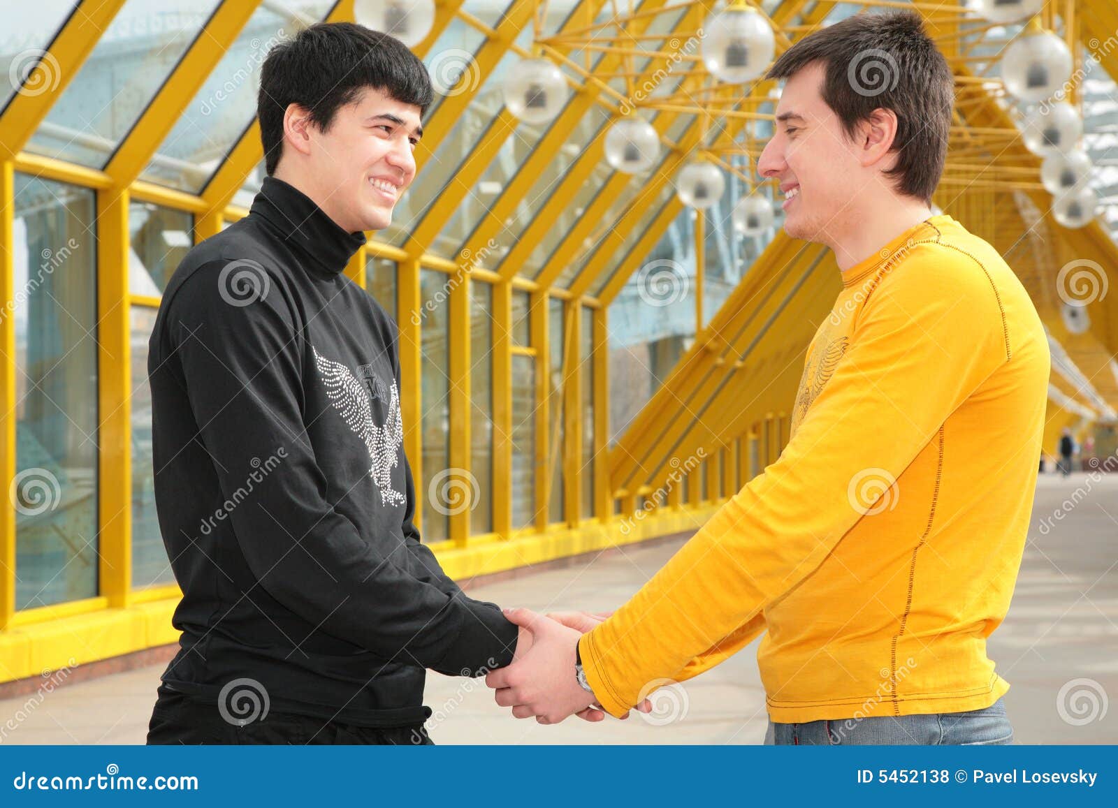 Two Friends Handshaking on Footbridge Stock Photo - Image of high ...
