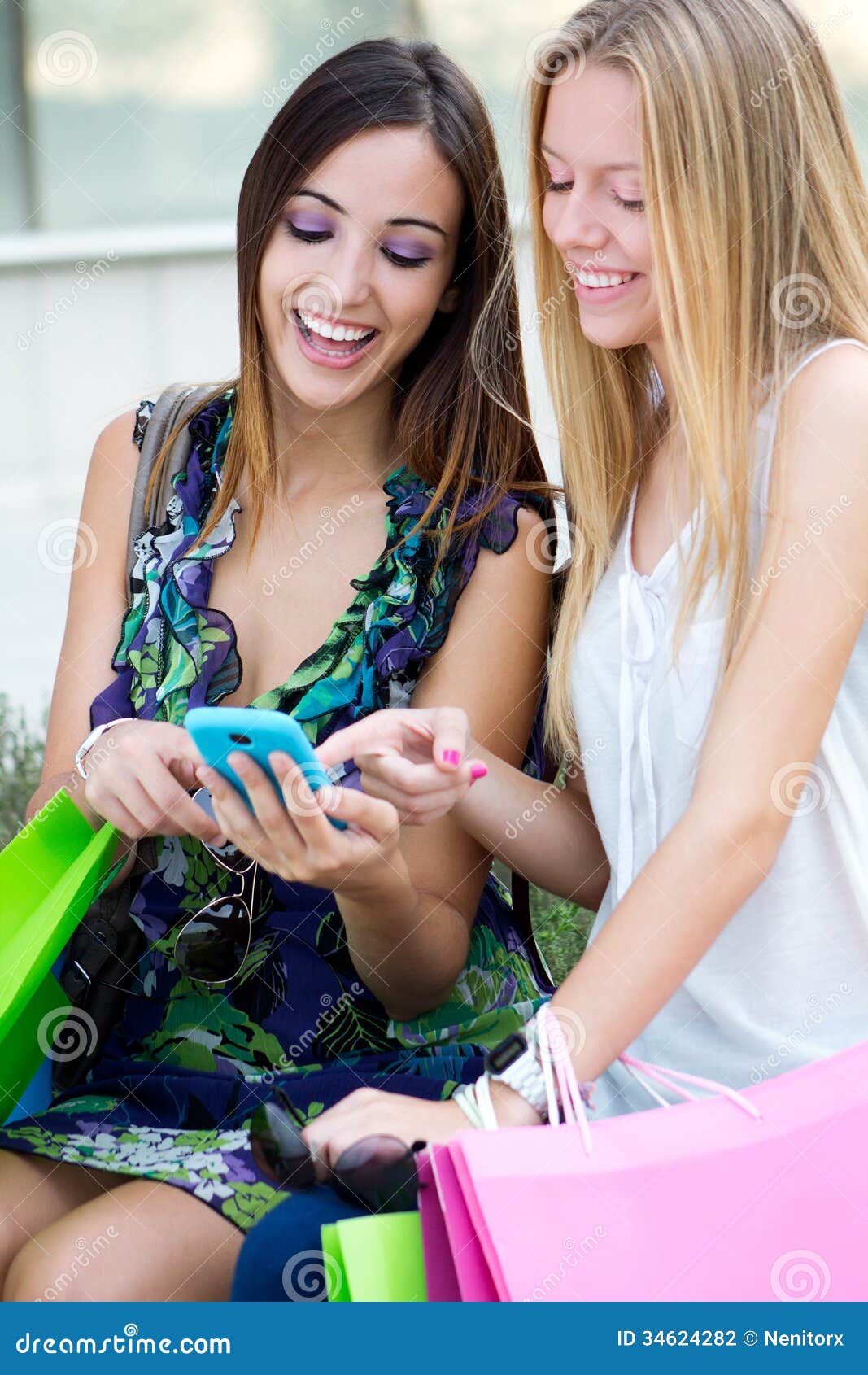 Two Friends Having Fun with Smartphones Stock Photo - Image of ...