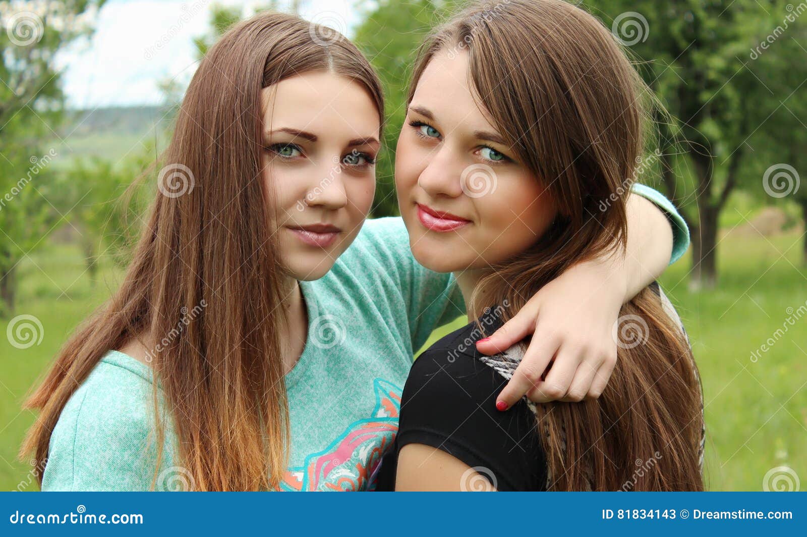 Two Friends Hugging in the Park Stock Image - Image of outdoors ...