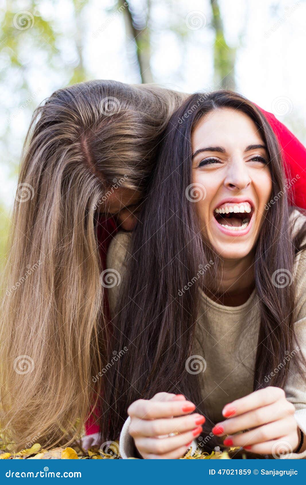 Two Friends Joking and Laughing, in the Park Stock Image - Image of ...
