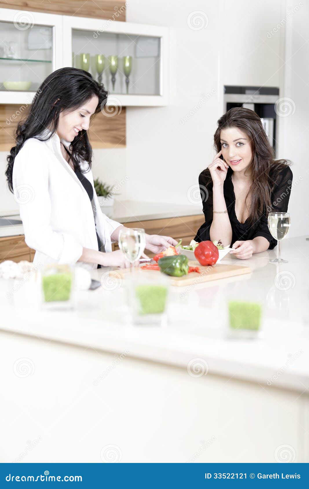 Two Friends in a Kitchen Cooking Stock Image - Image of recipe, glass ...