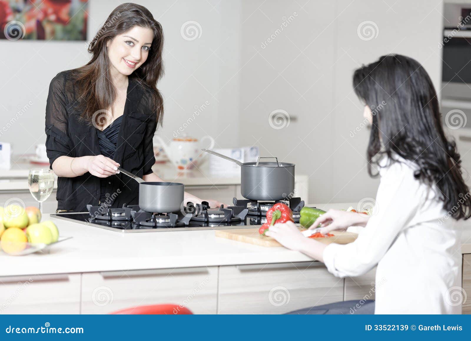 Two Friends in a Kitchen Cooking Stock Image - Image of house, girl ...