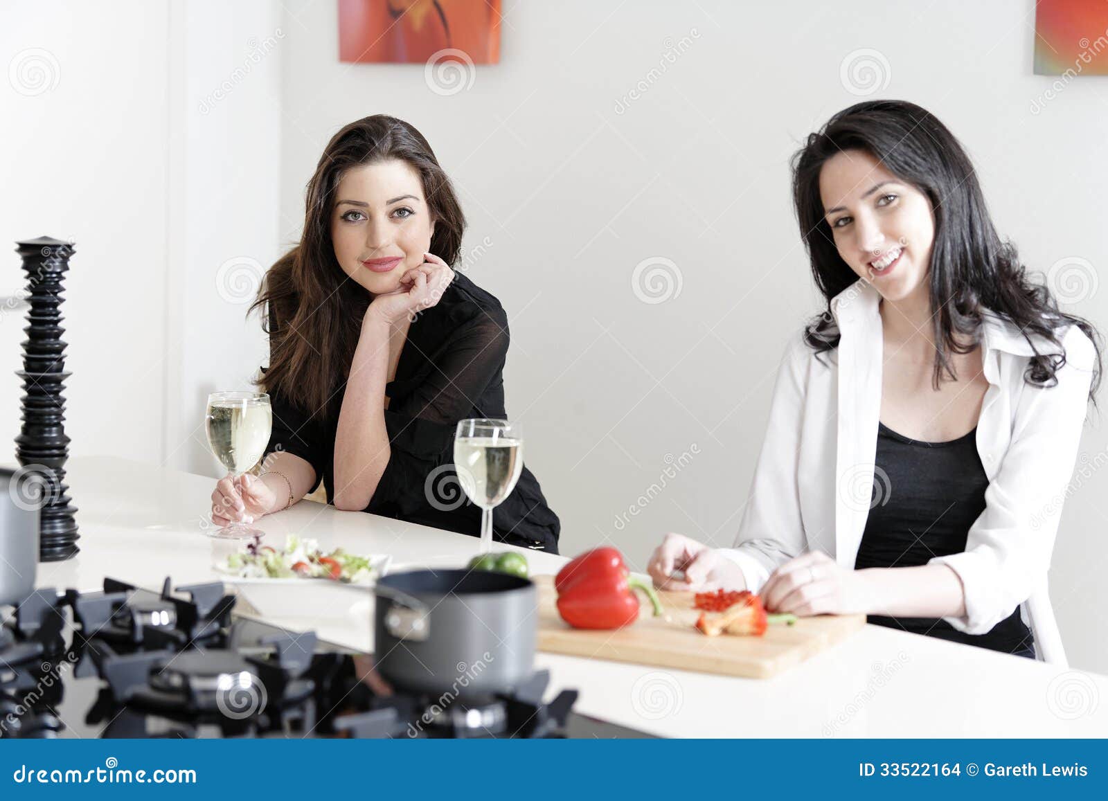Two Friends in a Kitchen Cooking Stock Photo - Image of attractive ...