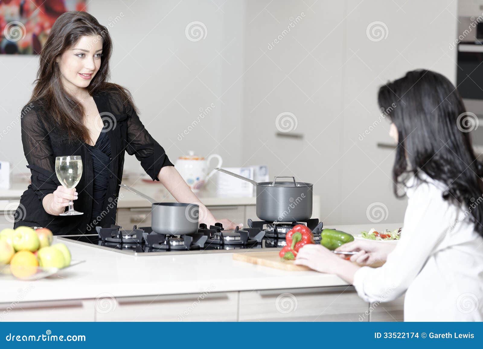 Two Friends in a Kitchen Cooking Stock Photo - Image of drinking ...