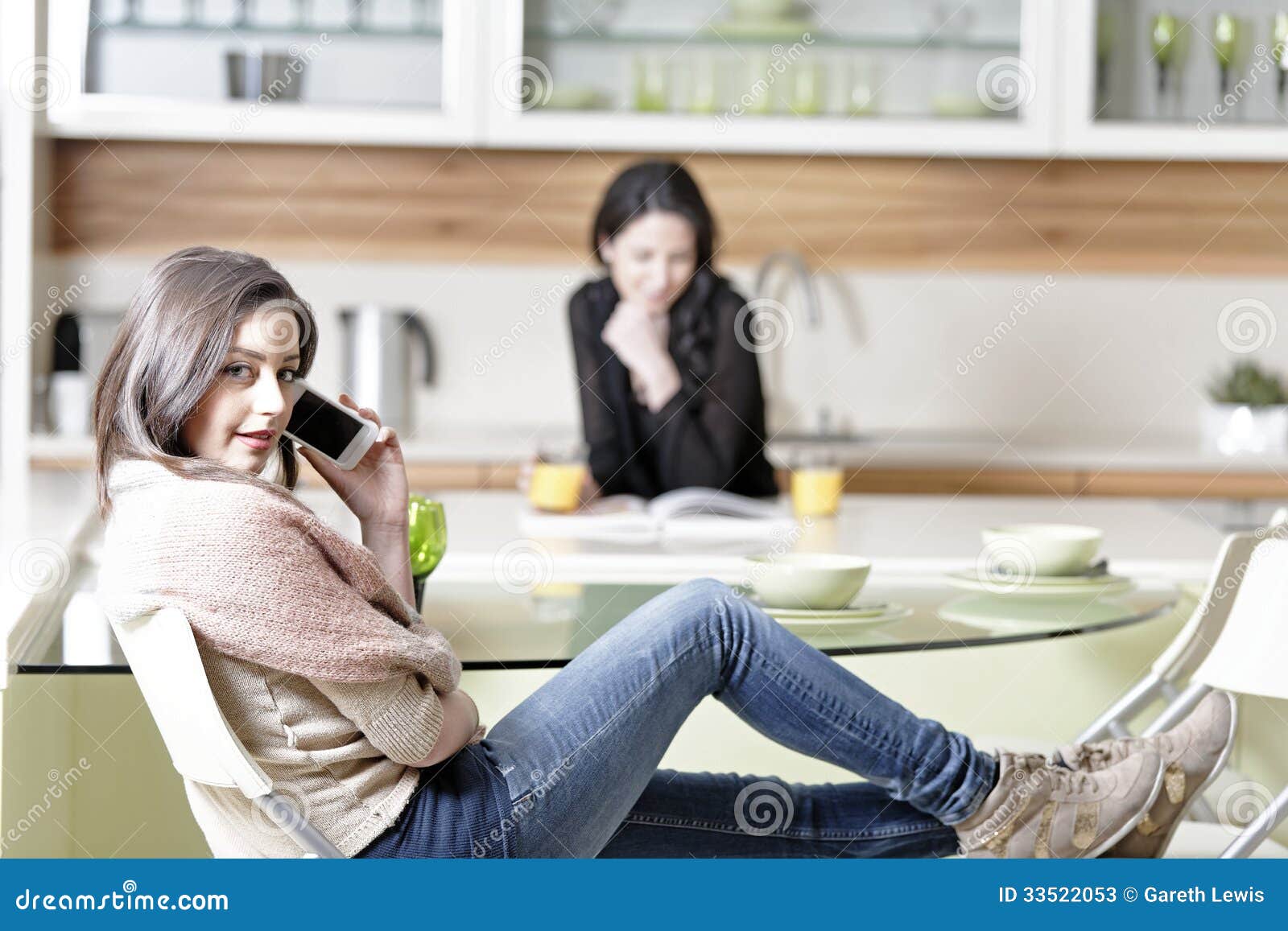 Two friends in a kitchen stock image. Image of happy - 33522053