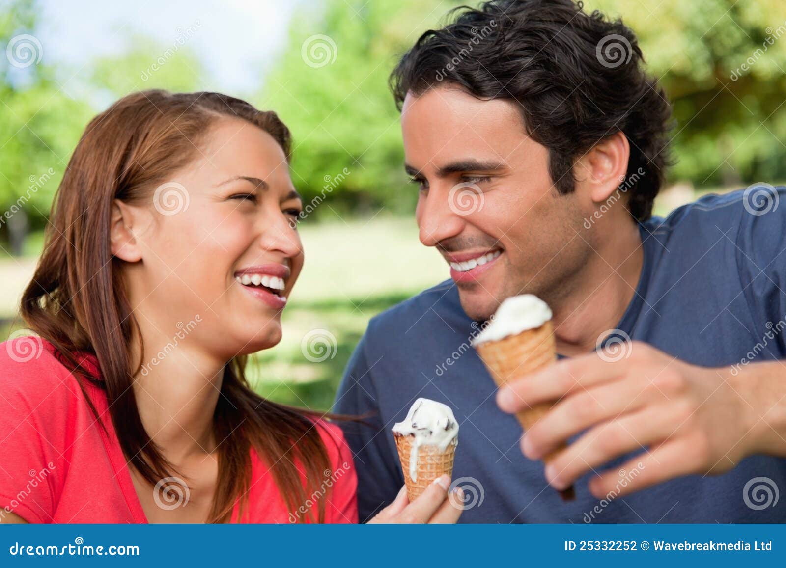 Two Friends Laughing while Holding Ice Cream Stock Photo - Image of ...