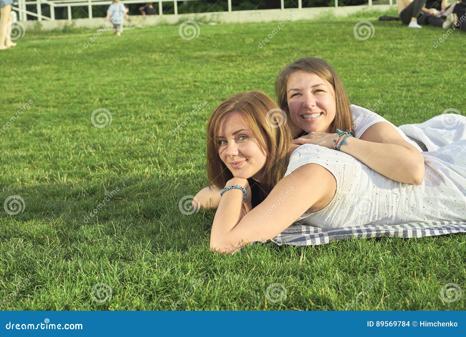 Two Friends Lying on the Lawn Stock Photo - Image of girl, girlfriend ...