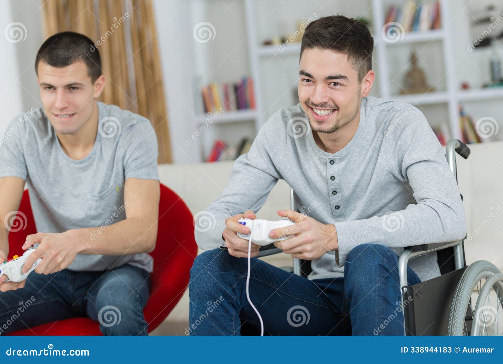 Two Friends Playing Computer Game One Disabled Stock Image - Image of ...