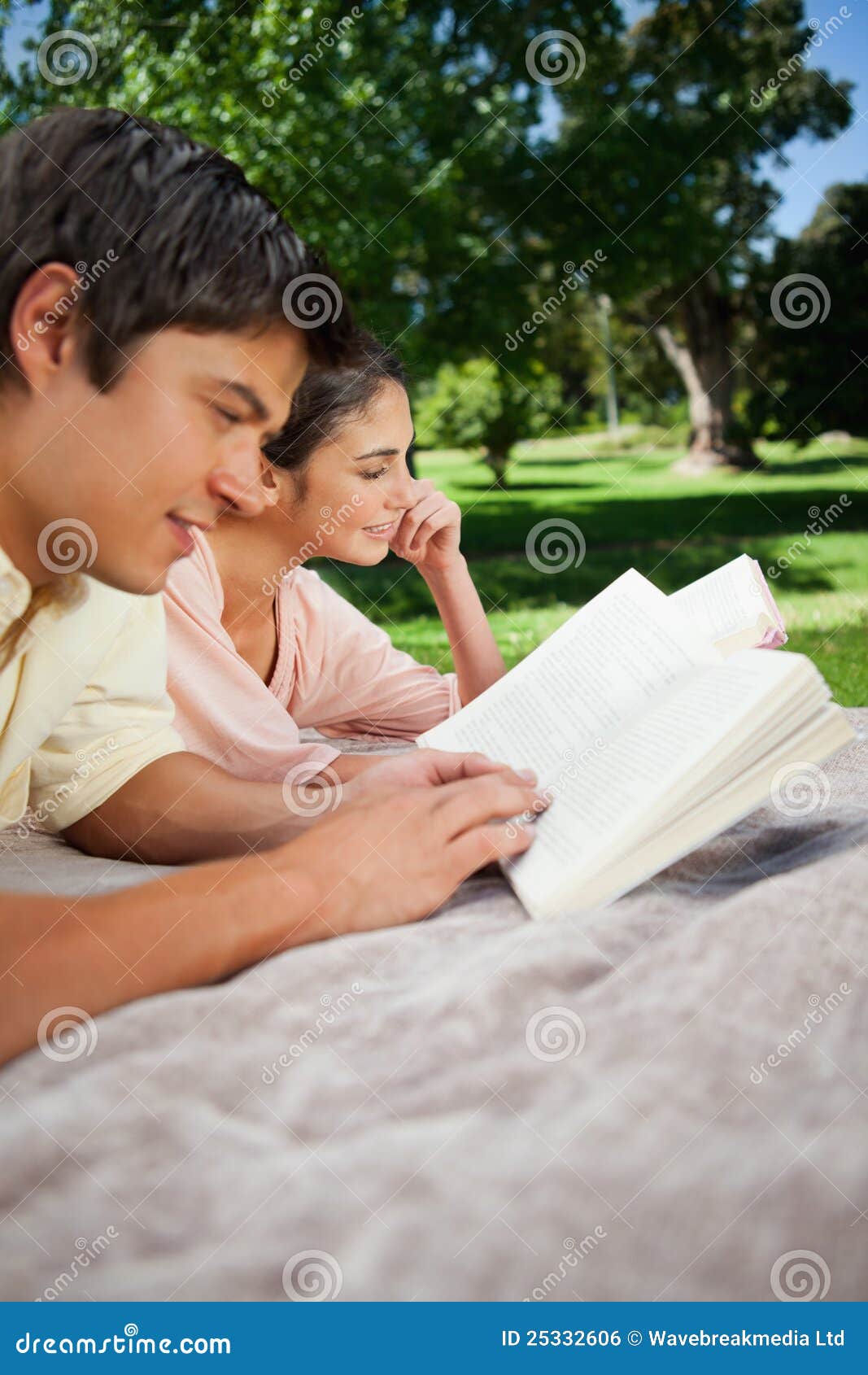 Two Friends Reading Books in a Park Stock Photo - Image of lying, books ...