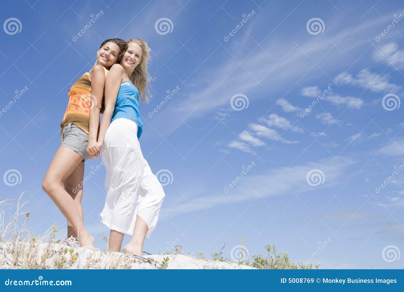 Two Friends Relaxing at Beach Stock Image - Image of casually, person ...