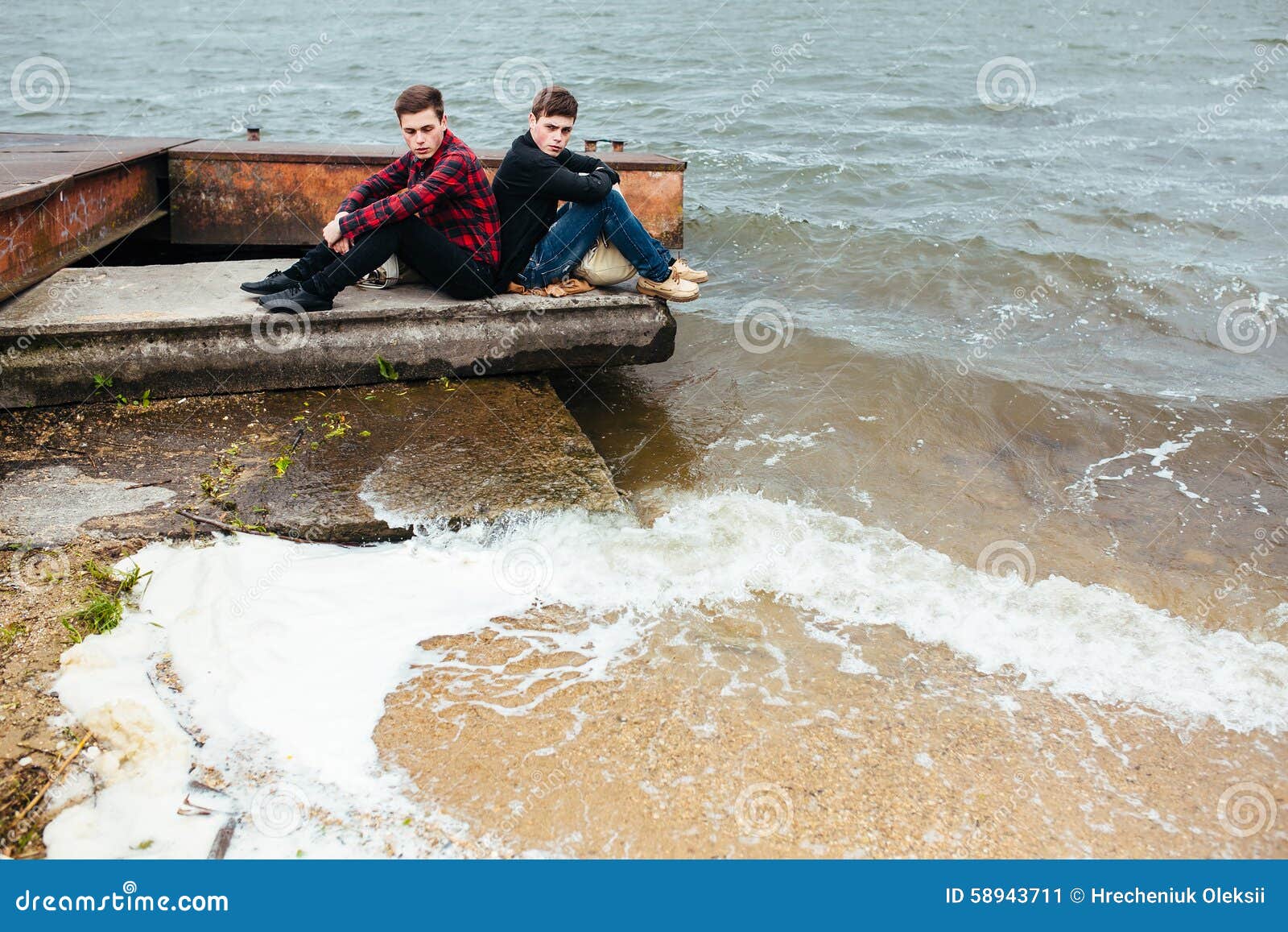 Two Friends Relaxing on the Pier. Stock Image - Image of adult ...