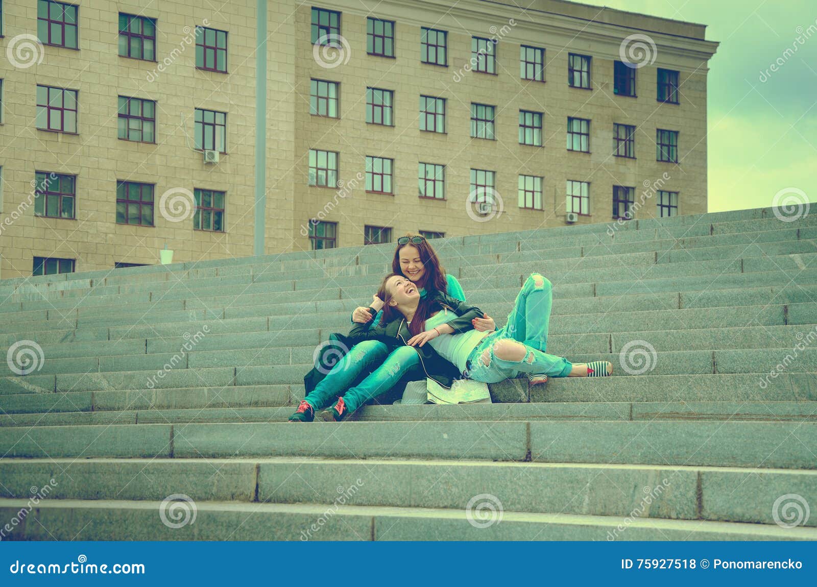 Two Friends are Resting on the Steps Stock Photo - Image of people ...