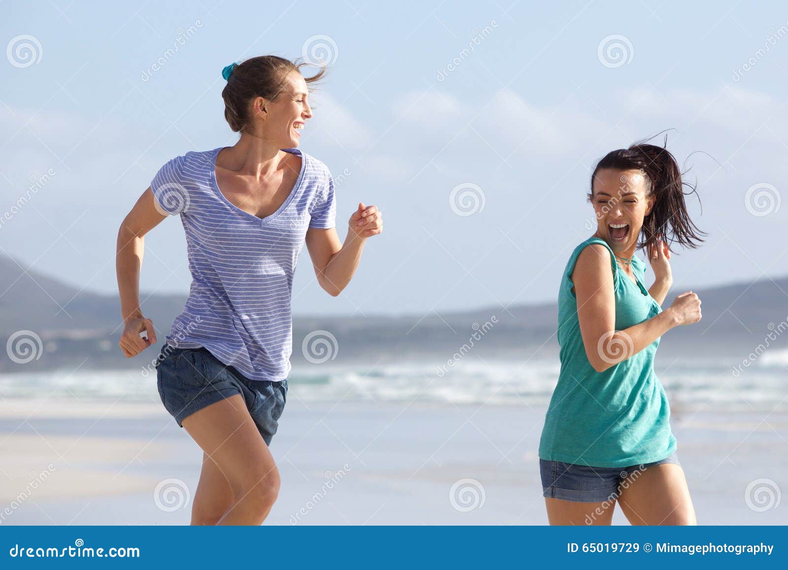 Two Friends Running in Summer at the Beach Stock Image - Image of coast ...