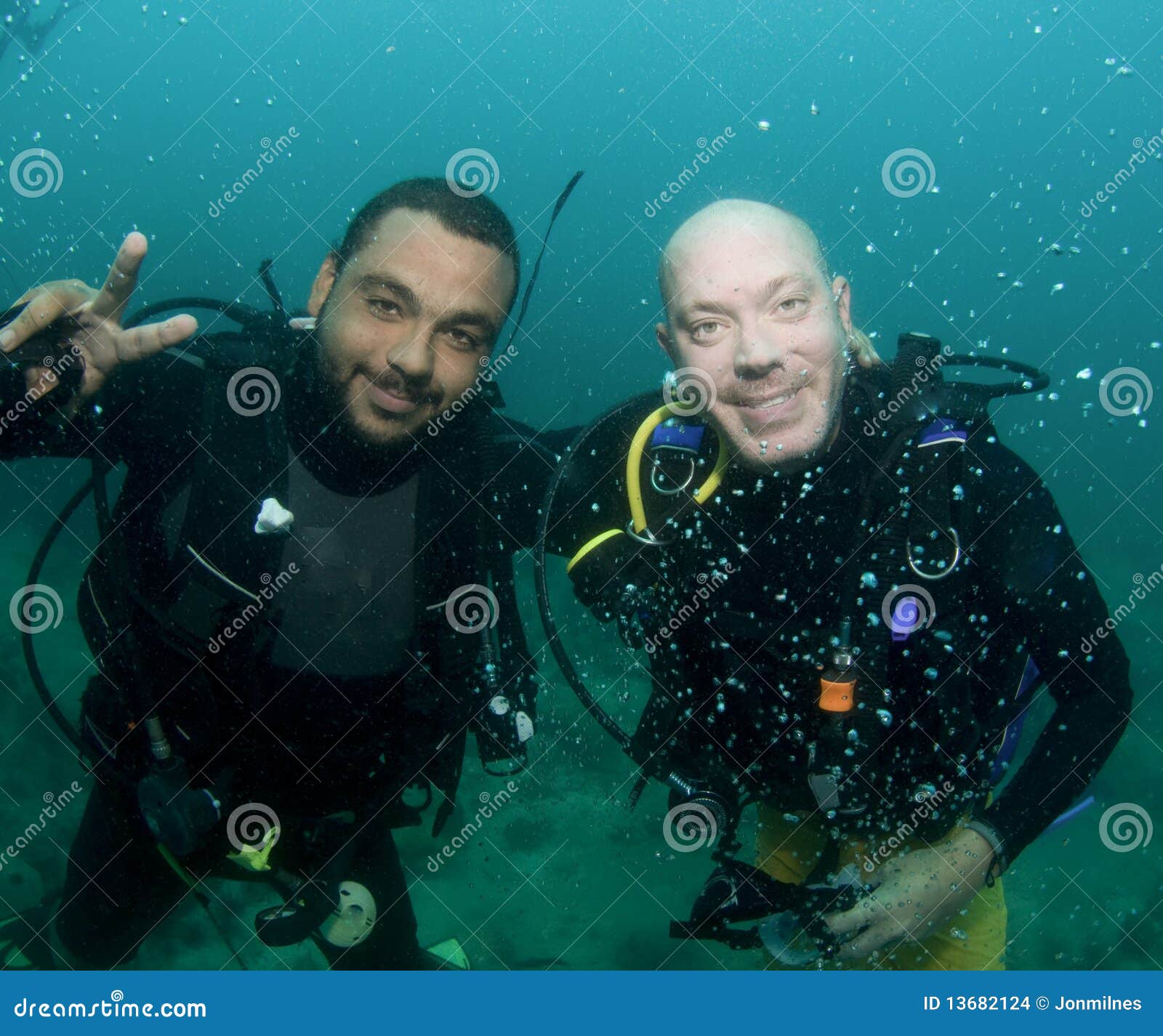 Two friends scuba diving stock photo. Image of scene - 13682124
