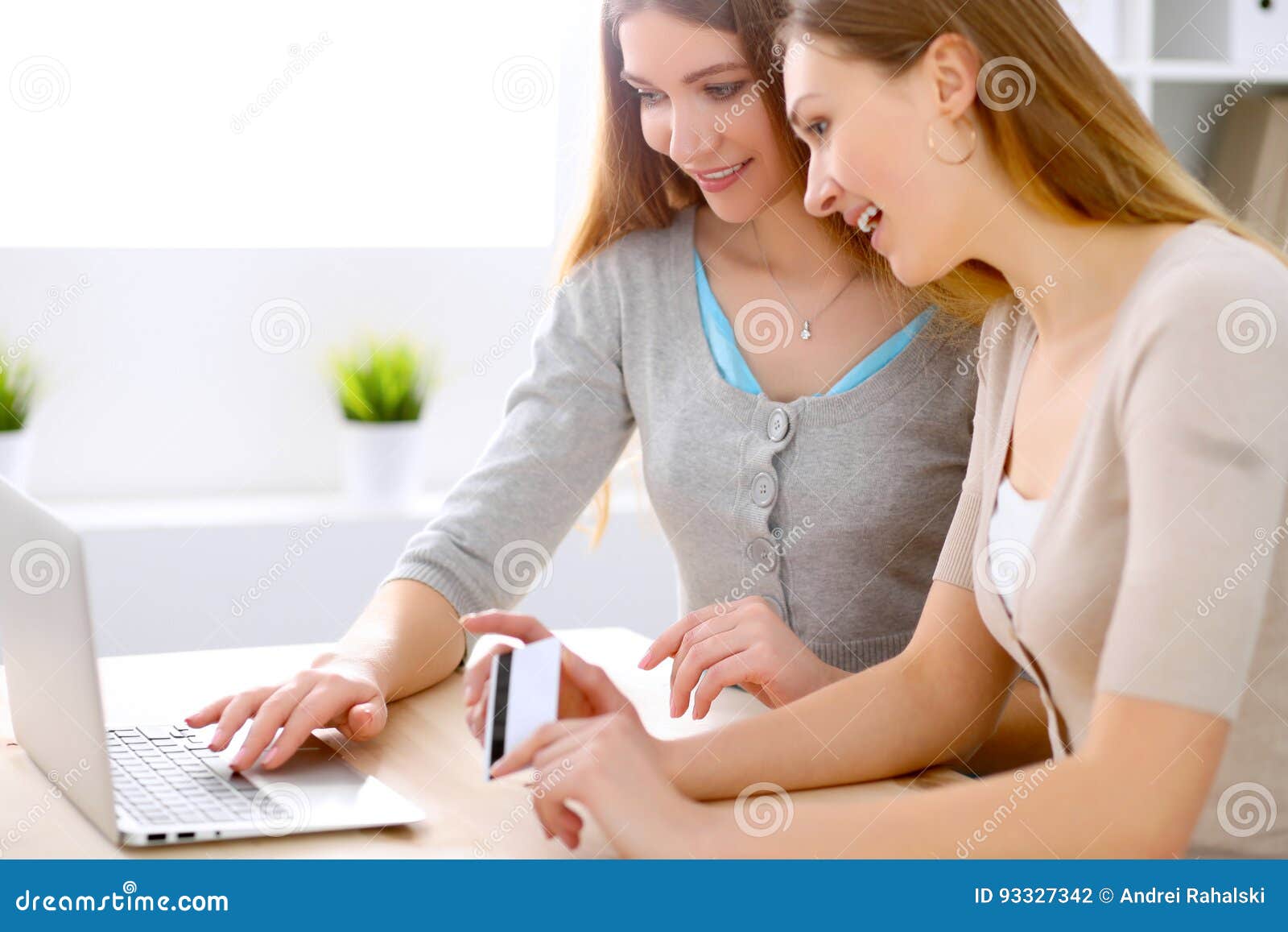 Two Friends or Sisters Talking Taking a Conversation at the Table with ...