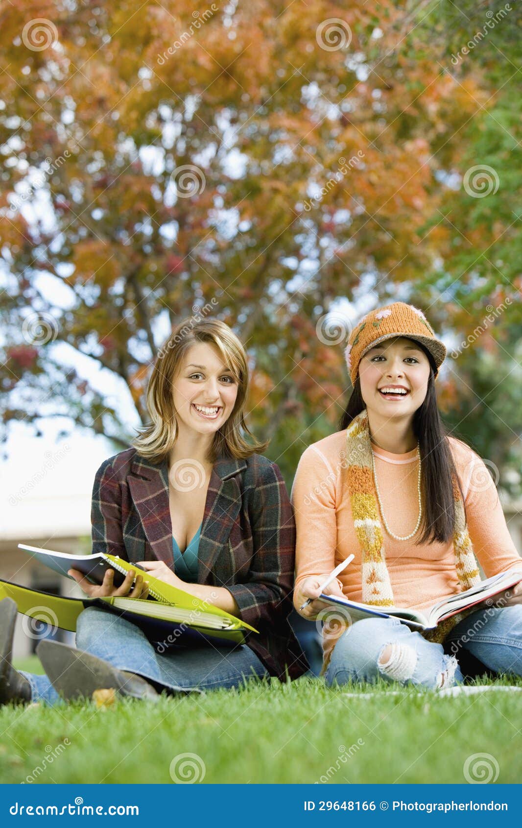 Two Friends Sitting Together Stock Photo - Image of outdoors, sitting ...