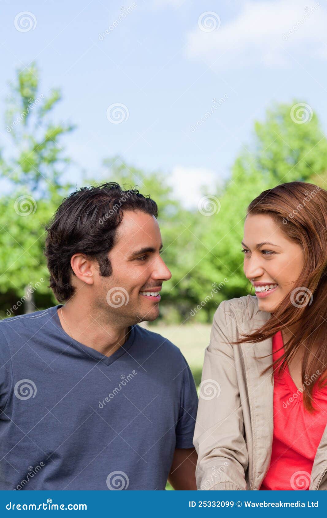 Two Friends Smiling As they Look into Each Others Eyes Stock Image ...