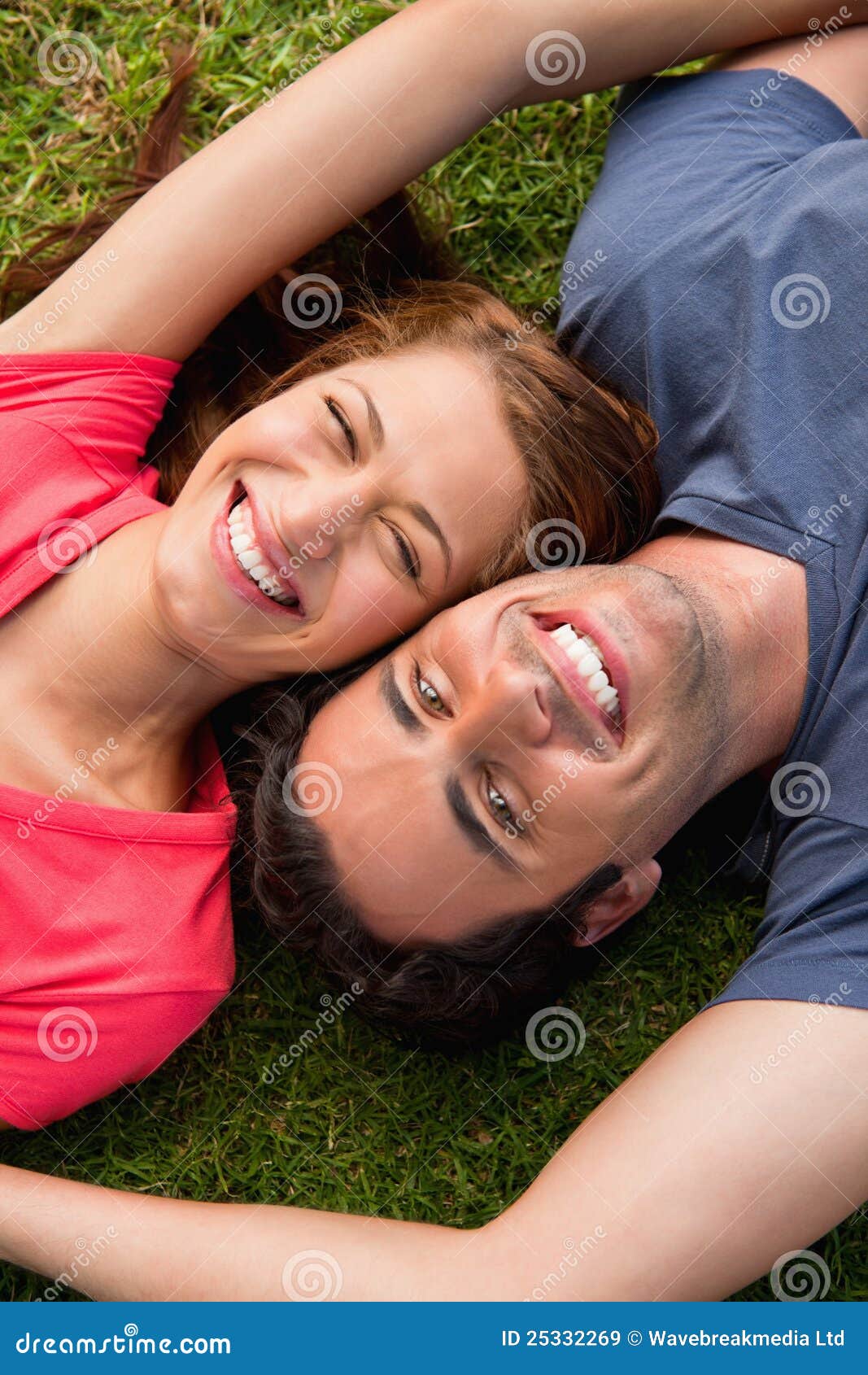 Two Friends Smiling while Lying Head To Shoulder with an Arm Out Stock ...