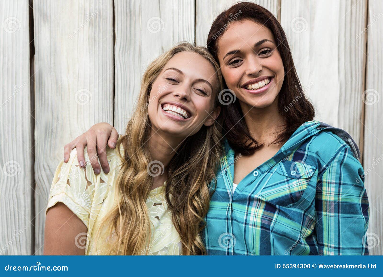 Two friends smiling stock photo. Image of cheerful, beautiful - 65394300