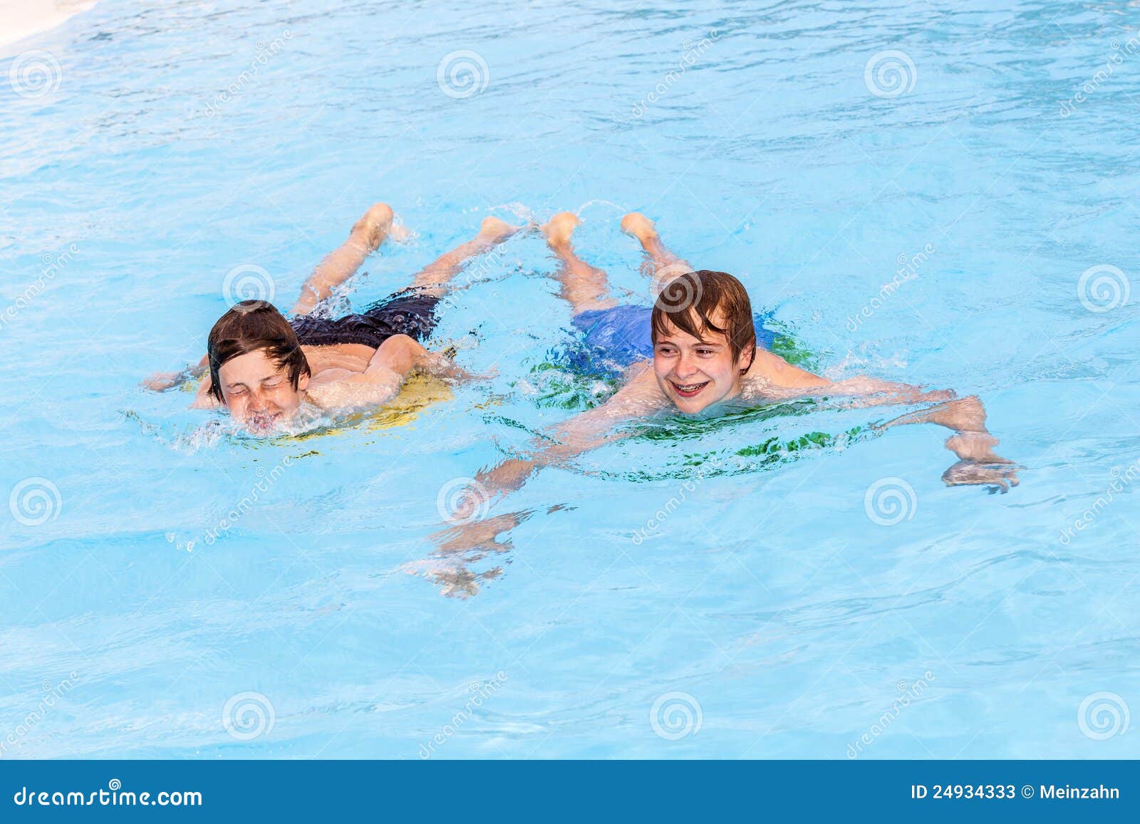 Two Friends Swimming in the Pool Stock Image - Image of male, playing ...