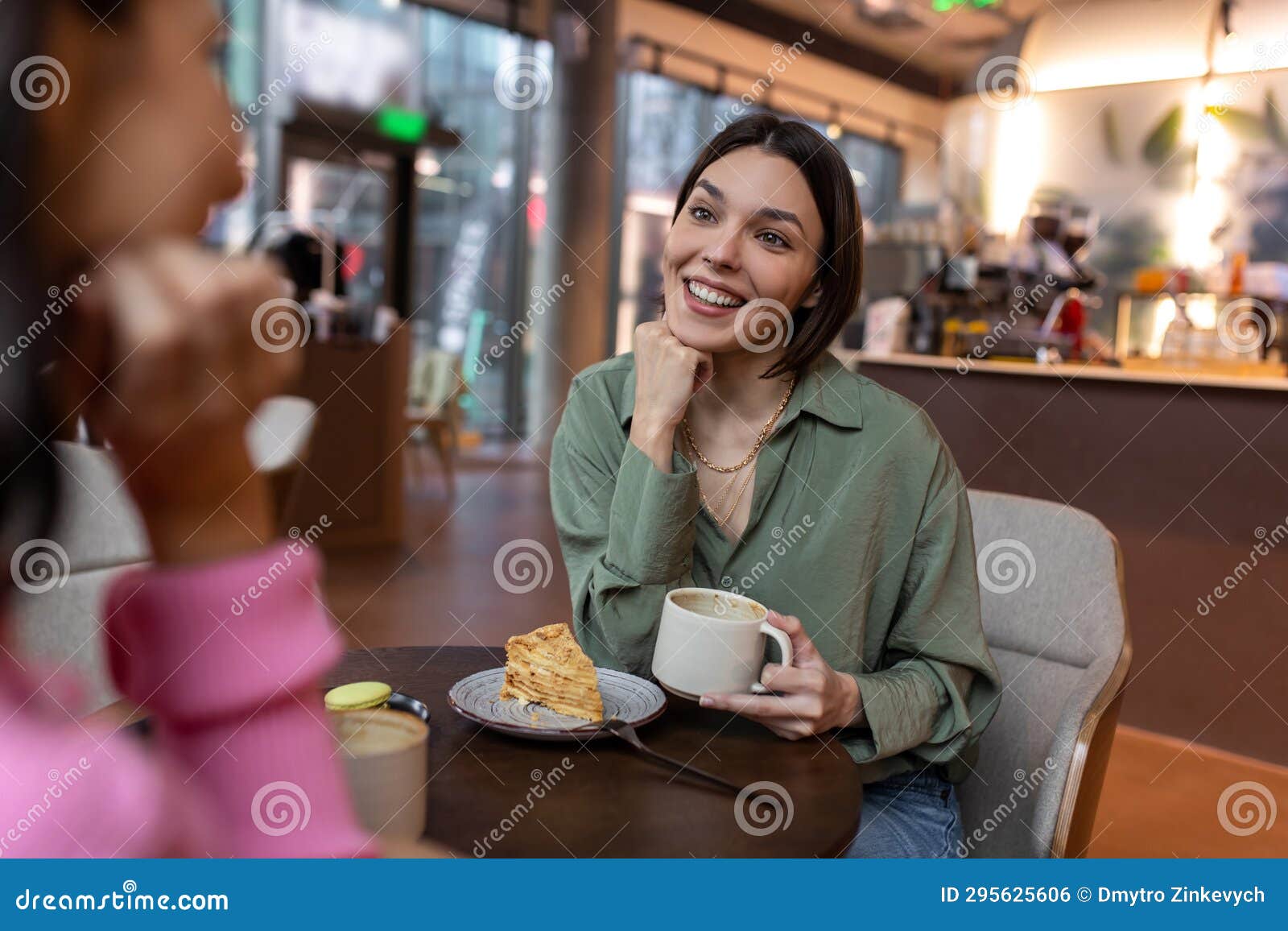 Two Friends Talking in a Cafe and Looking Involved Stock Photo - Image ...