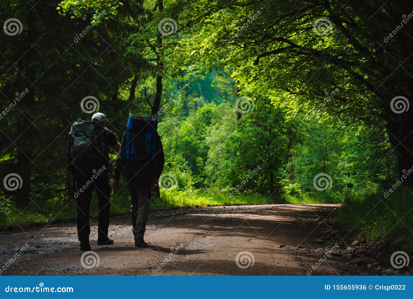 Two Friends Travel in Mountains with Backpacks Stock Photo - Image of ...