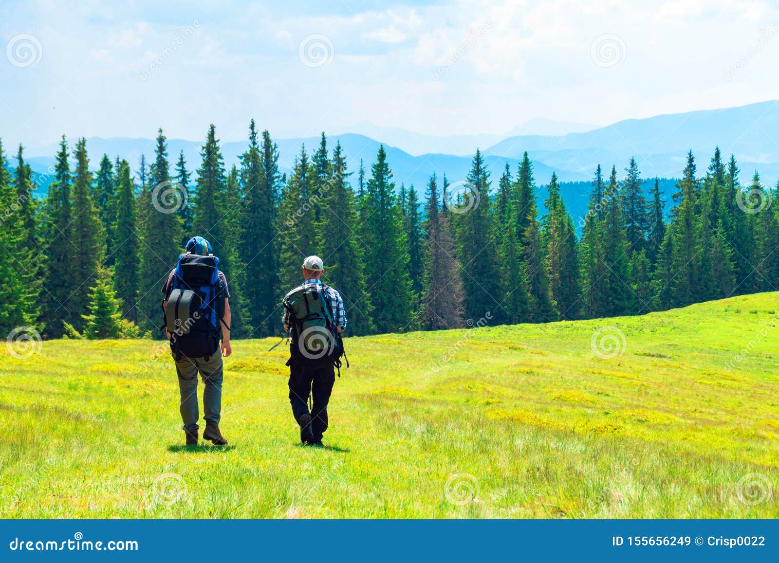 Two Friends Travel in Mountains with Backpacks Stock Image - Image of ...