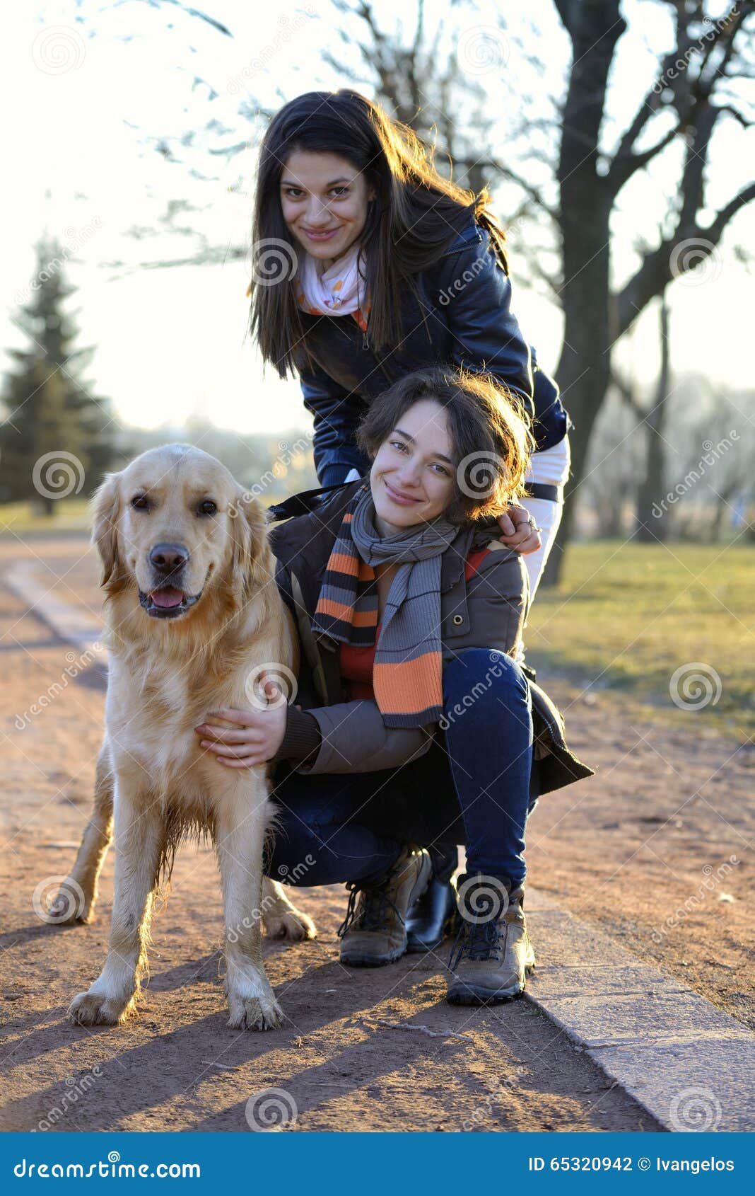 Two Friends Walking the Dog Stock Photo - Image of european, people ...