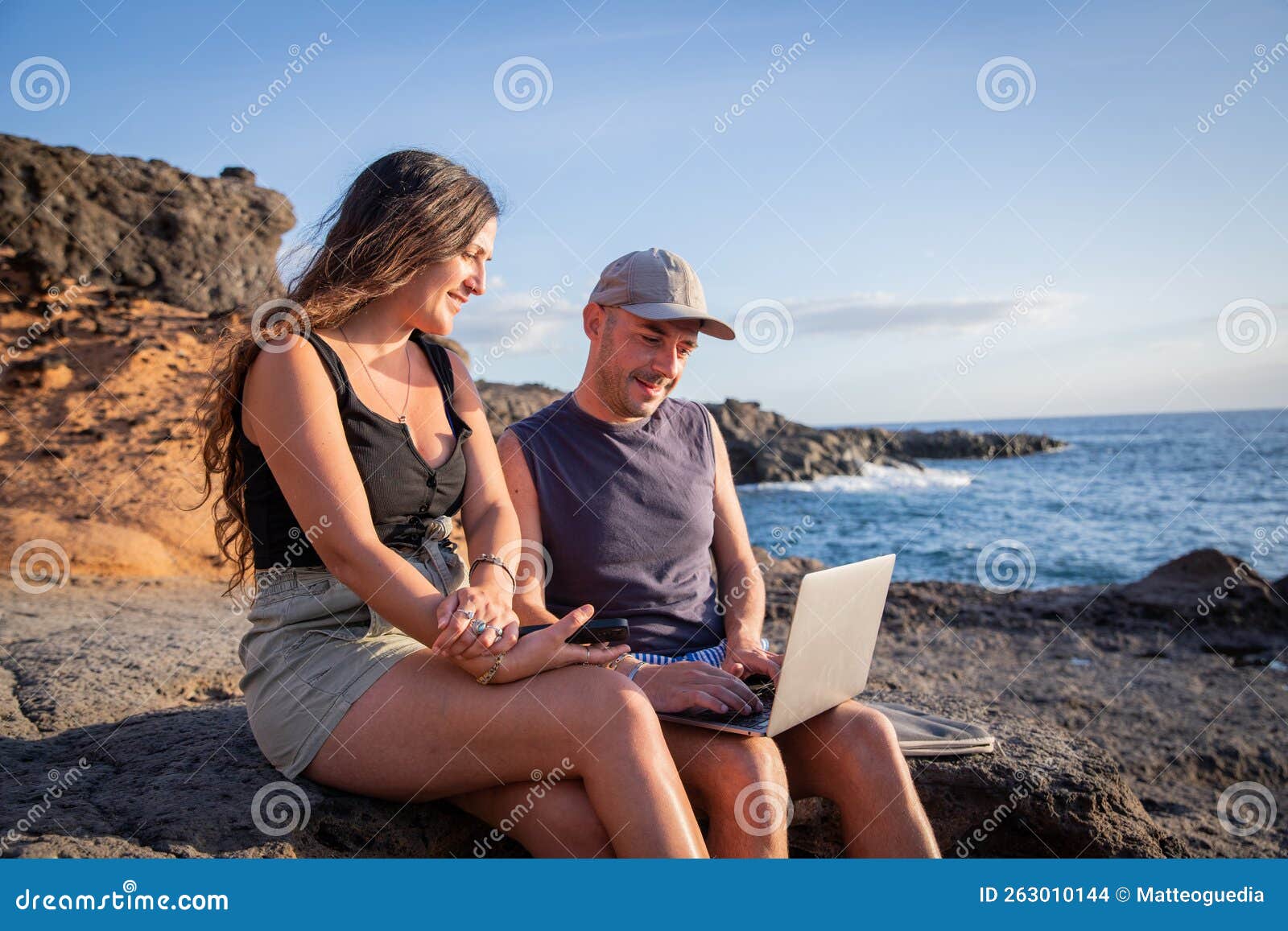 Two Friends Work at the Beach with Laptop, Young Digital Entrepreneurs ...