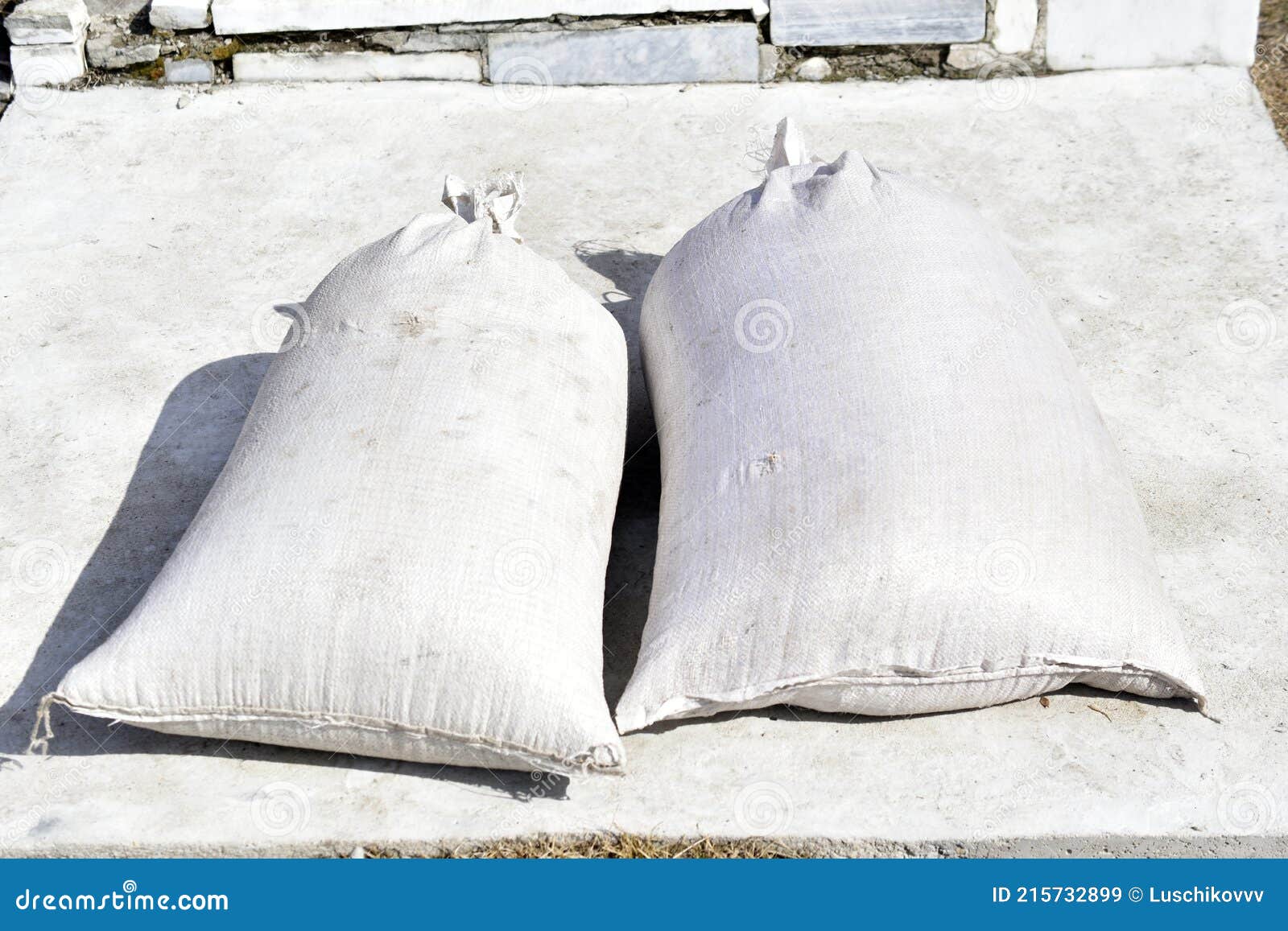Two Full Sacks of Grain on the Ground in the Yard Stock Image - Image ...
