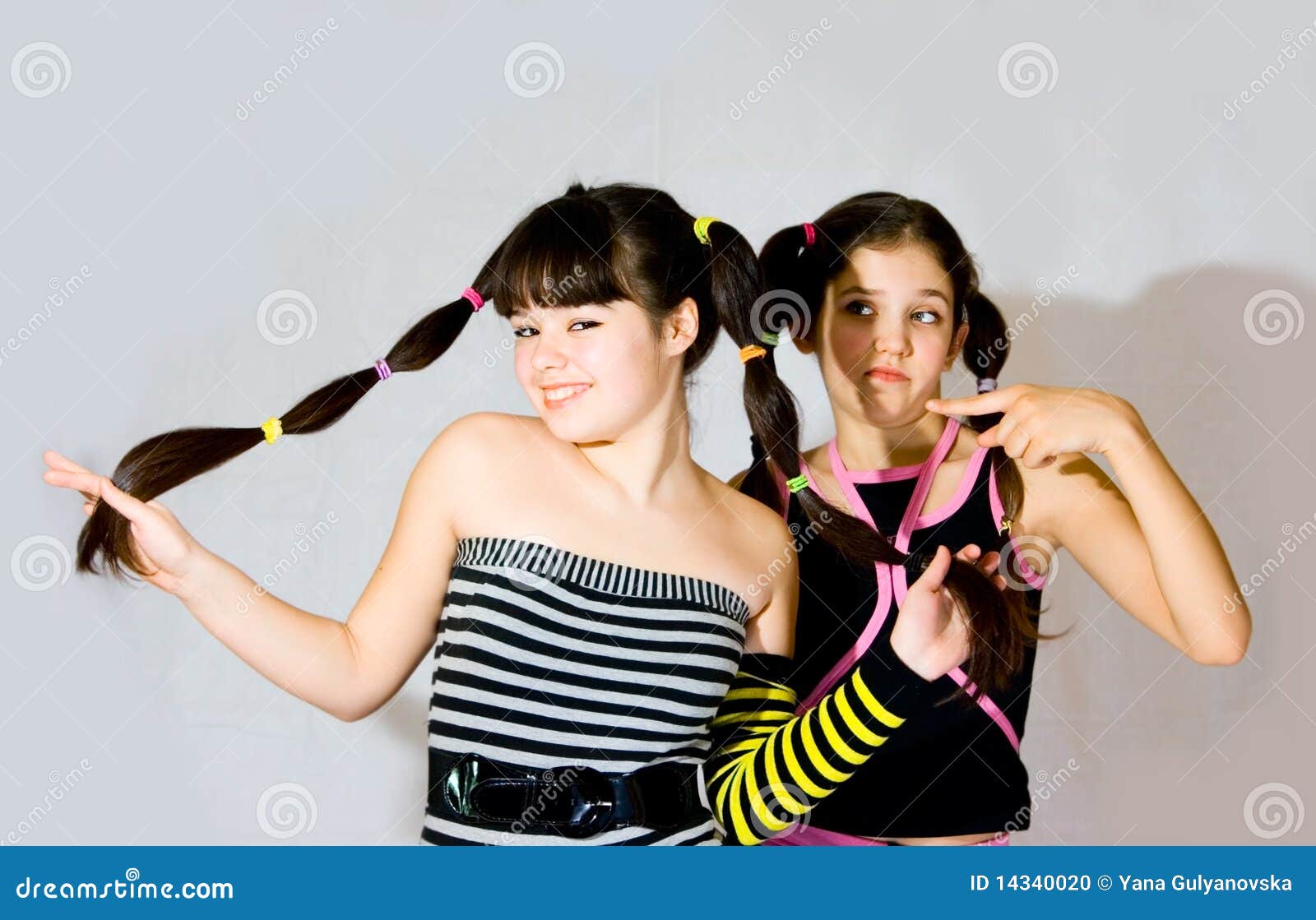 Two fun teen girls stock photo. Image of face, envious - 14340020