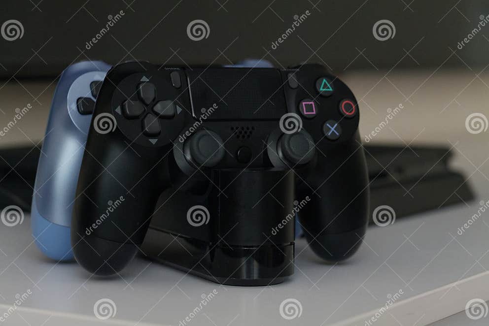 Two Game Controllers in the Charging Station .black Gaming Controller ...